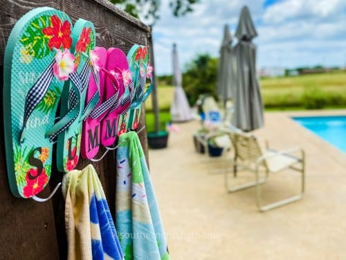 Easy Pool Towel Rack (using Dollar Tree Flip Flops)