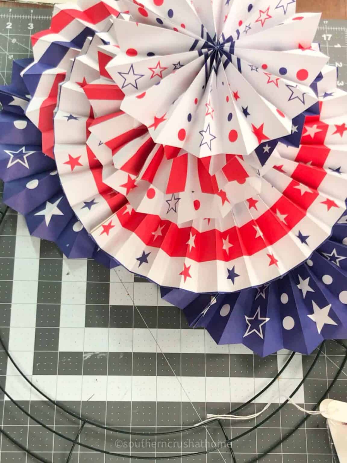 How to Make a Stunning Red, White, and Blue Paper Fan Wreath - Southern ...